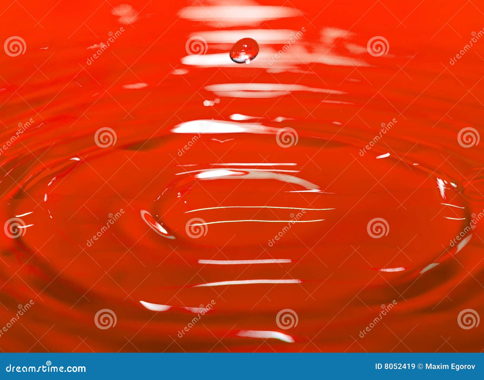 The drop in red water stock image. Image of fall, blue - 8052419