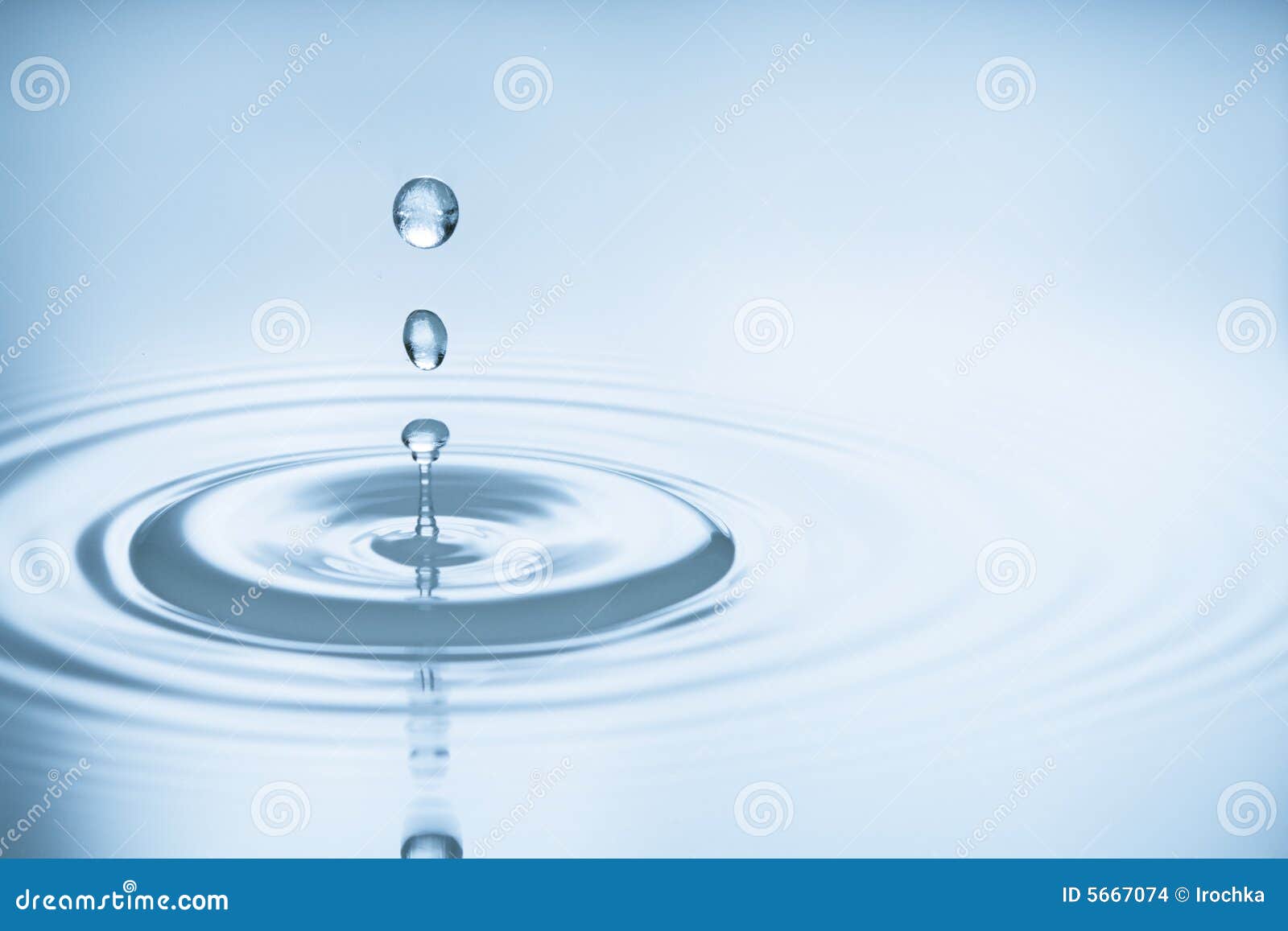 Drop splashing in water stock photo. Image of blues, ripples - 5667074