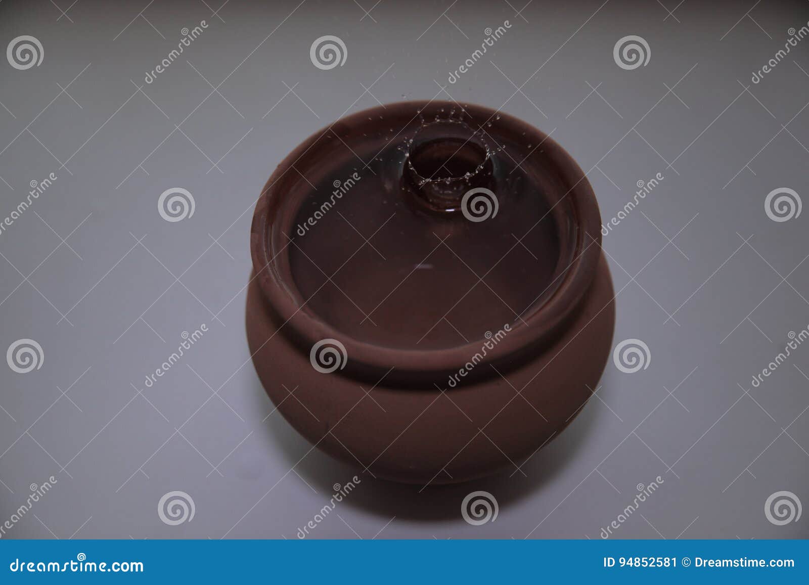 A Drop of Water in a Clay Pot Stock Image - Image of wave, vessel: 94852581