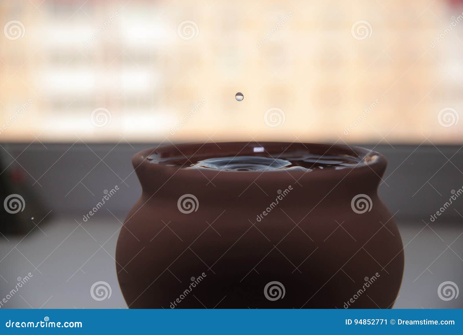 A Drop of Water in a Clay Pot Stock Image - Image of surface, color ...