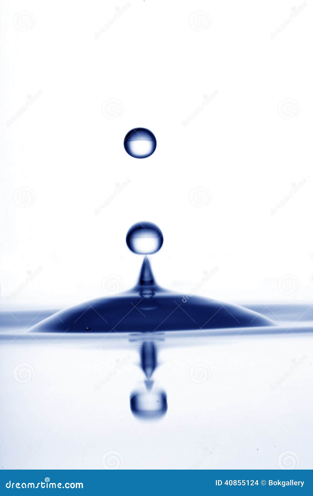 Drop of water in dark blue stock photo. Image of droplet - 40855124
