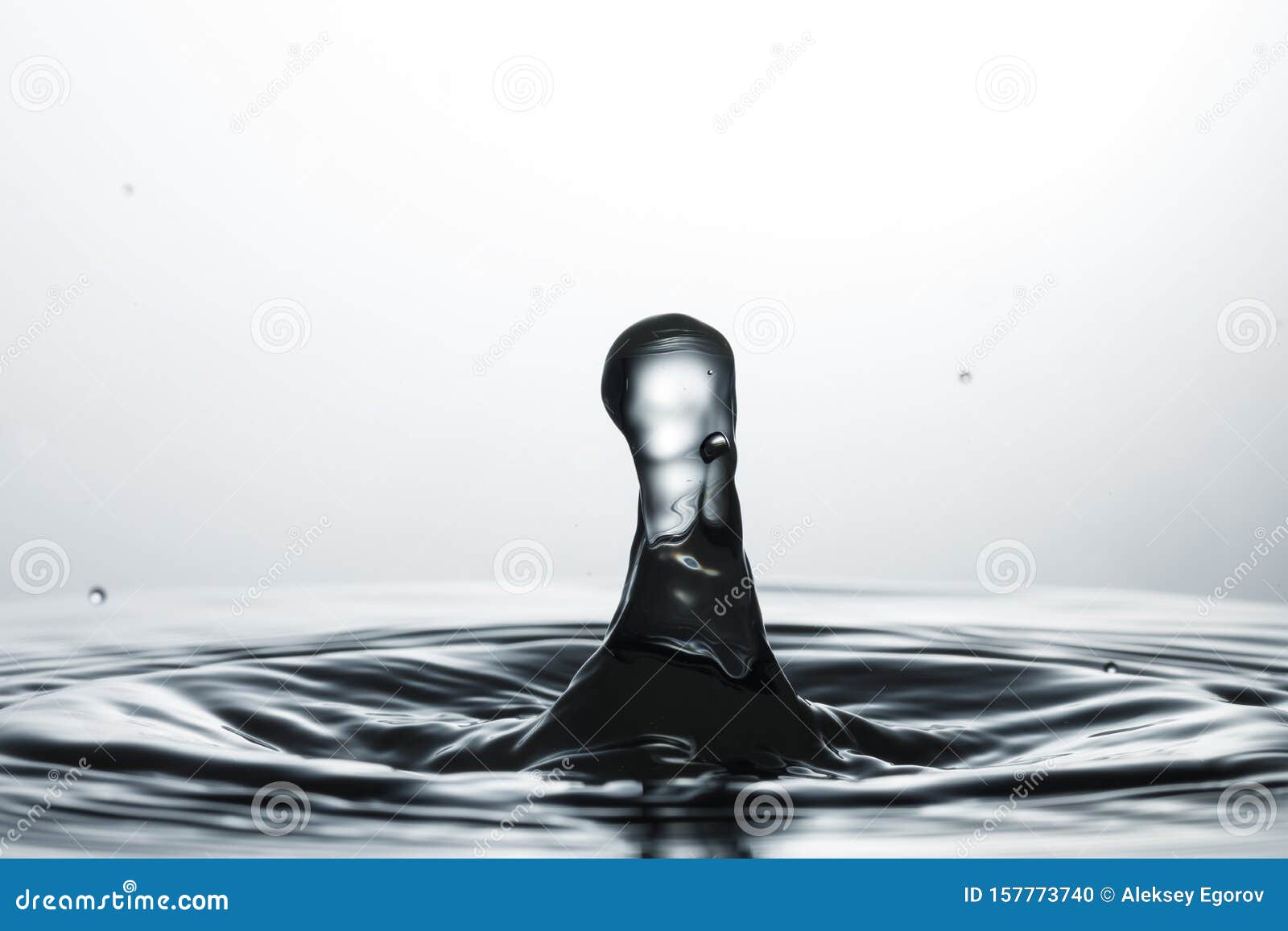 Drop of Water Falling Down in the Water Stock Photo - Image of bubble ...