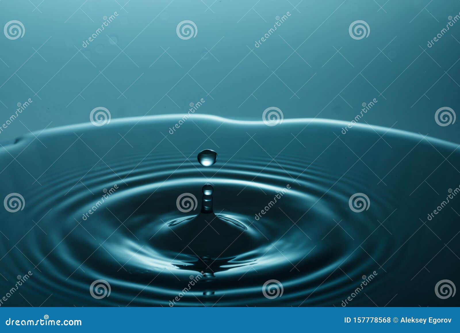 Drop of Water Falling Down in the Water Stock Photo - Image of blue ...