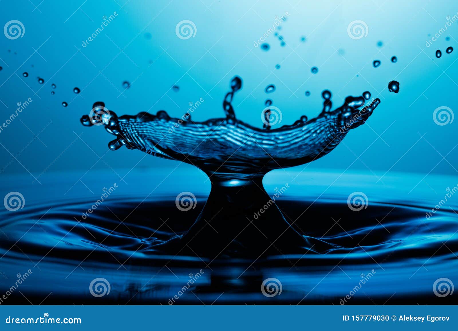 Drop of Water Falling Down in the Water Stock Photo - Image of colored ...
