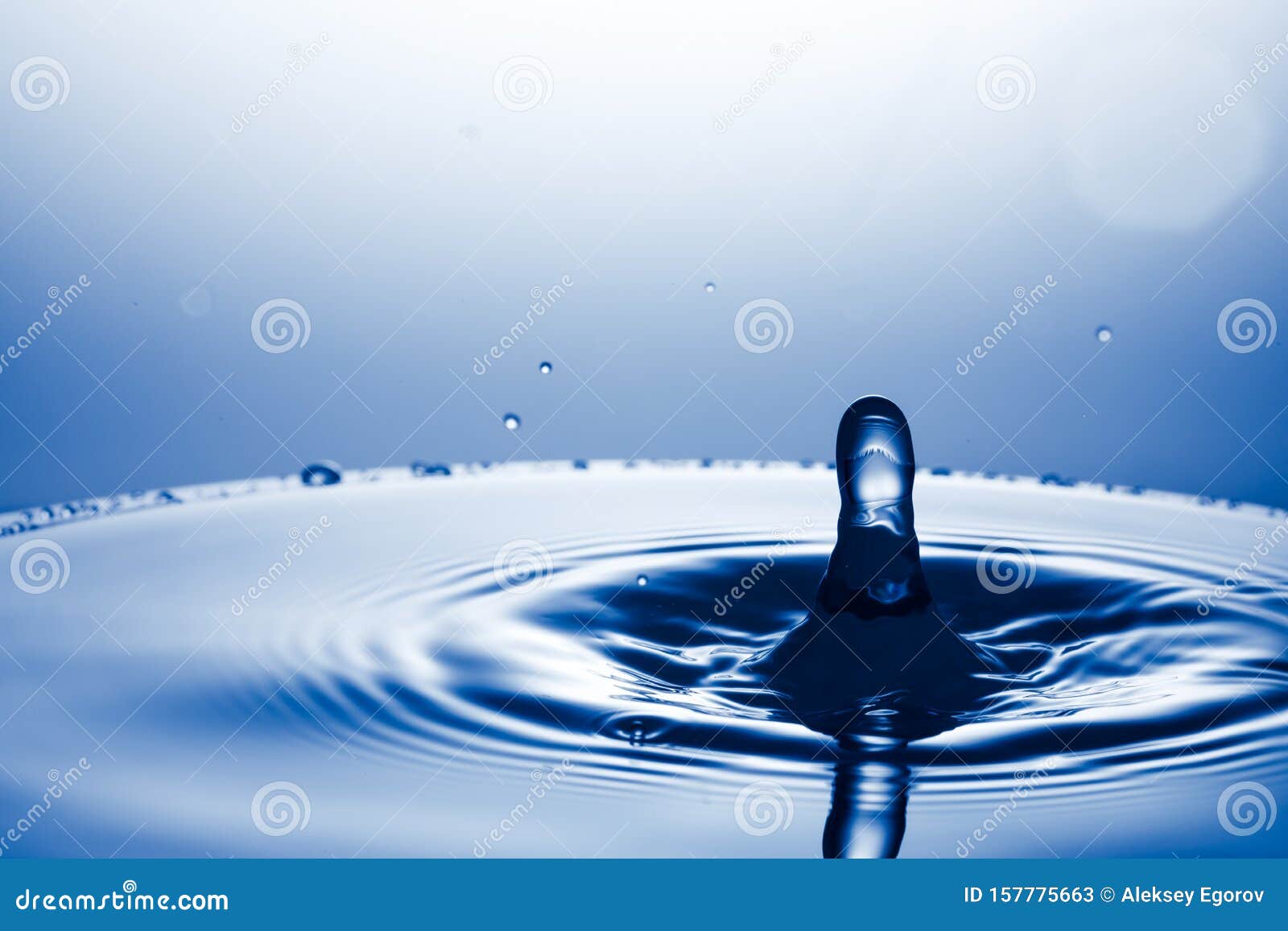Drop of Water Falling Down in the Water Stock Image - Image of blue ...