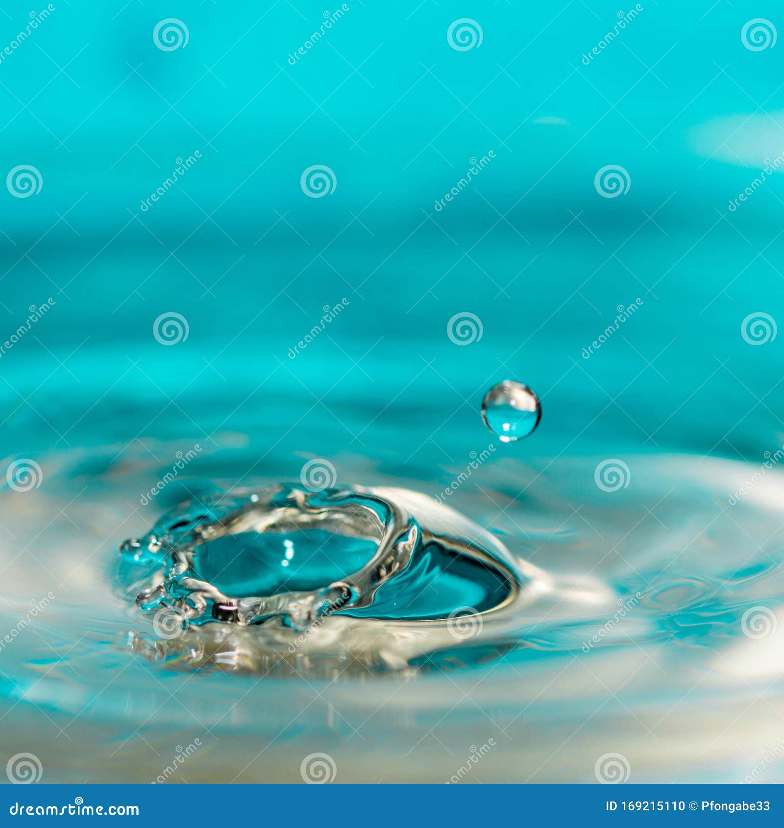 Drop of Water Falling into the Water and Leaving Abstract Shapes and ...