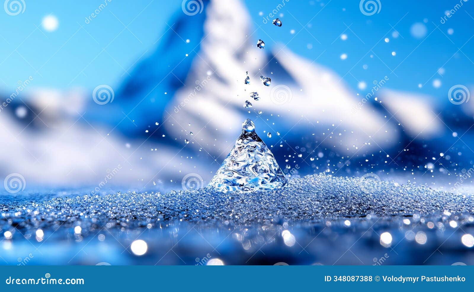 A Drop of Water Falling into the Water with a Mountain in the ...
