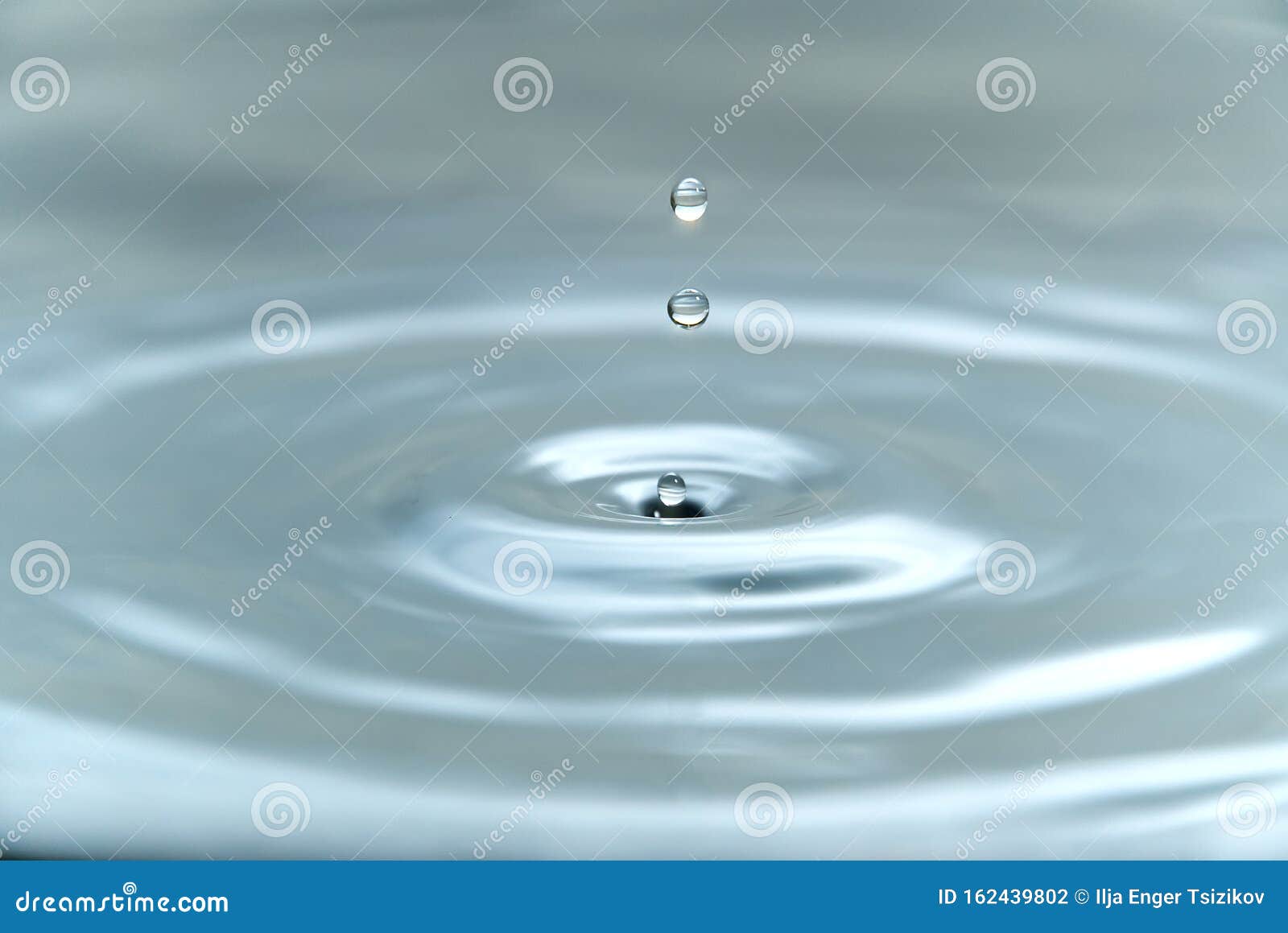 A Drop of Water Hovering in the Air before Hitting a Water Surface ...