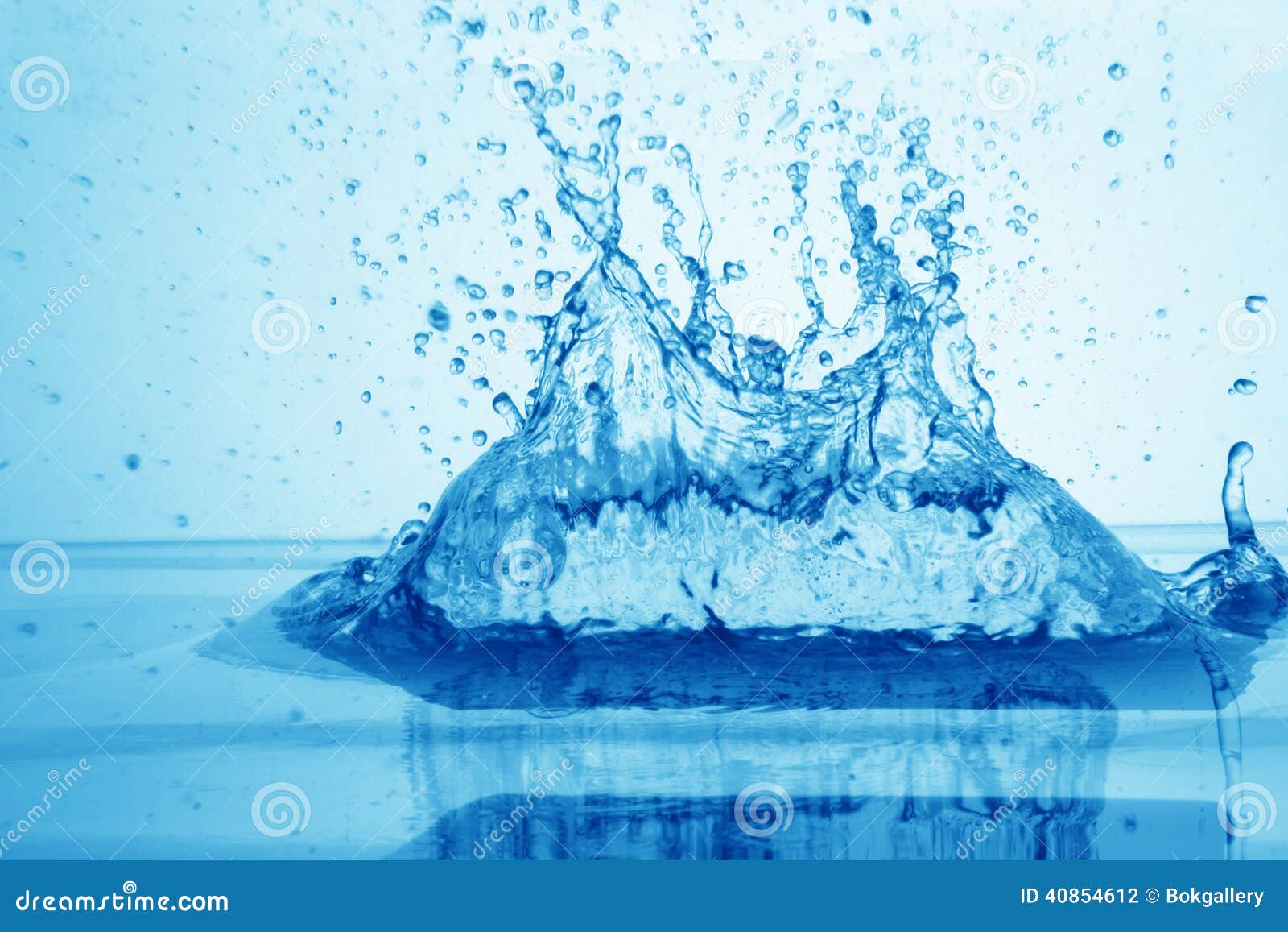 Drop of Water in Puddle in Blue Stock Photo - Image of drop, freshness ...