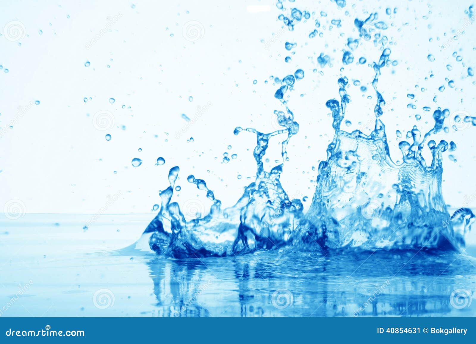 Drop Of Water In Puddle In Blue Stock Photo - Image: 40854631