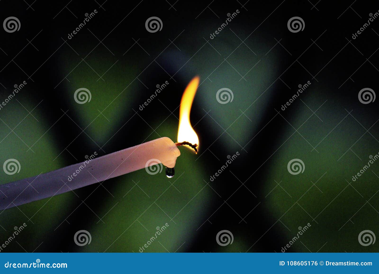 A Drop of Wax Falling from Melting Point of a Burning Candle Stock ...