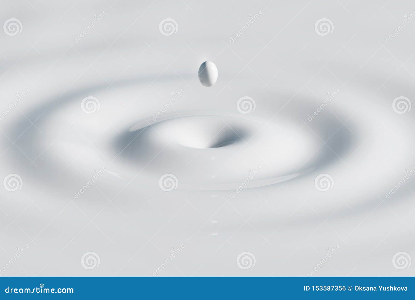 A Drop of White Milk Falling on the Surface and Creating a Divorce - 3D ...