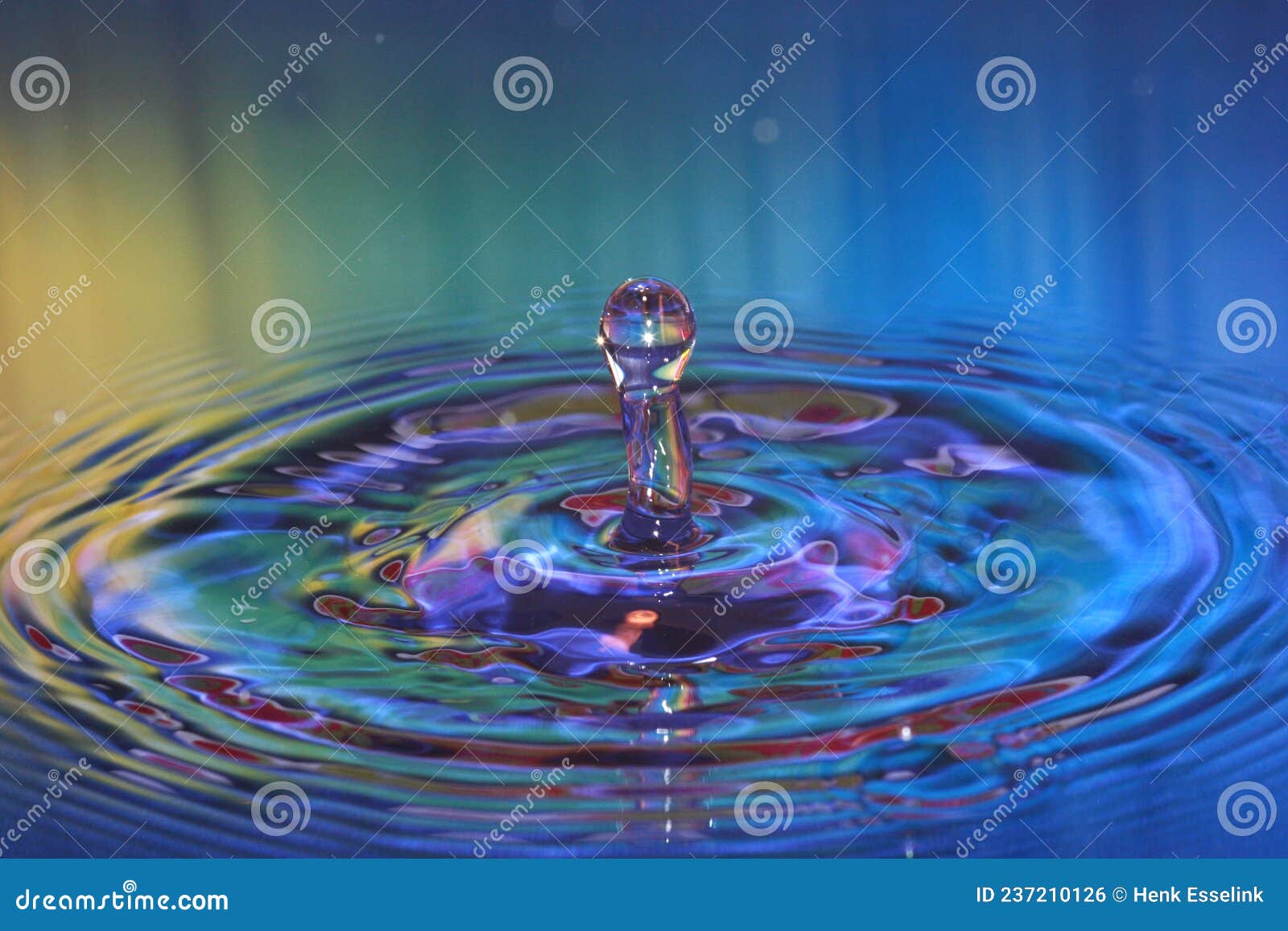 Droplet making splash stock photo. Image of pattern - 237210126 Droplet making splash stock photo. Image of pattern - 237210126