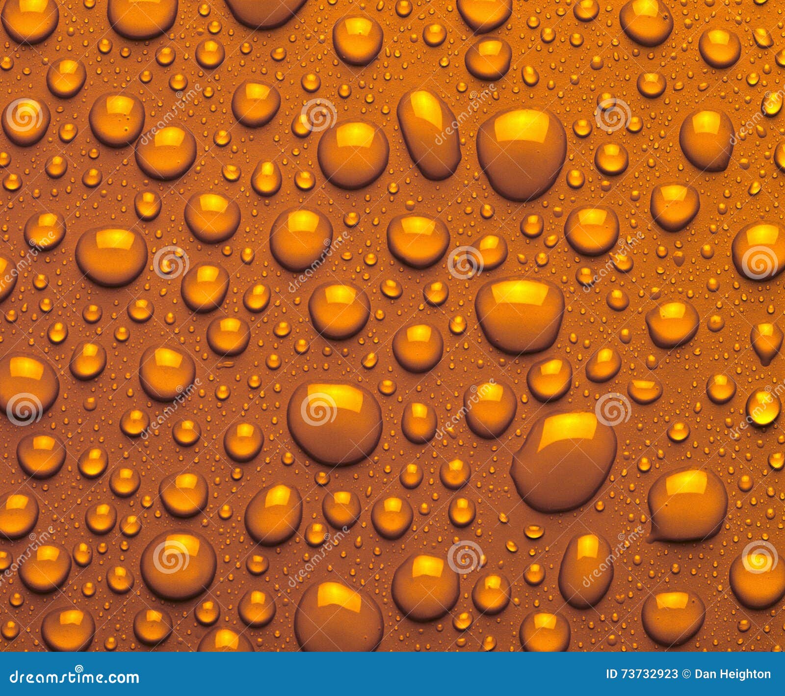 Droplets of amber liquid stock image. Image of detail - 73732923