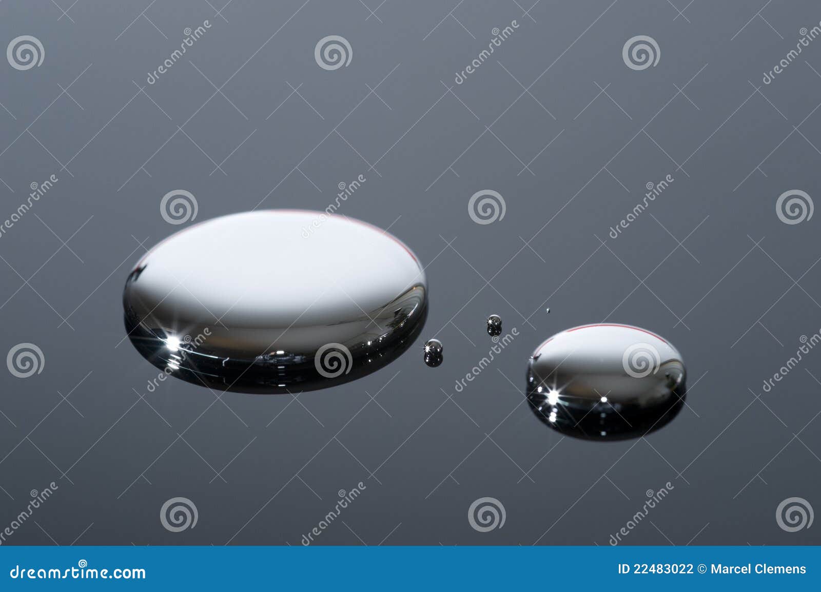 Droplets of Mercury on a Reflective Surface Stock Photo - Image of ...