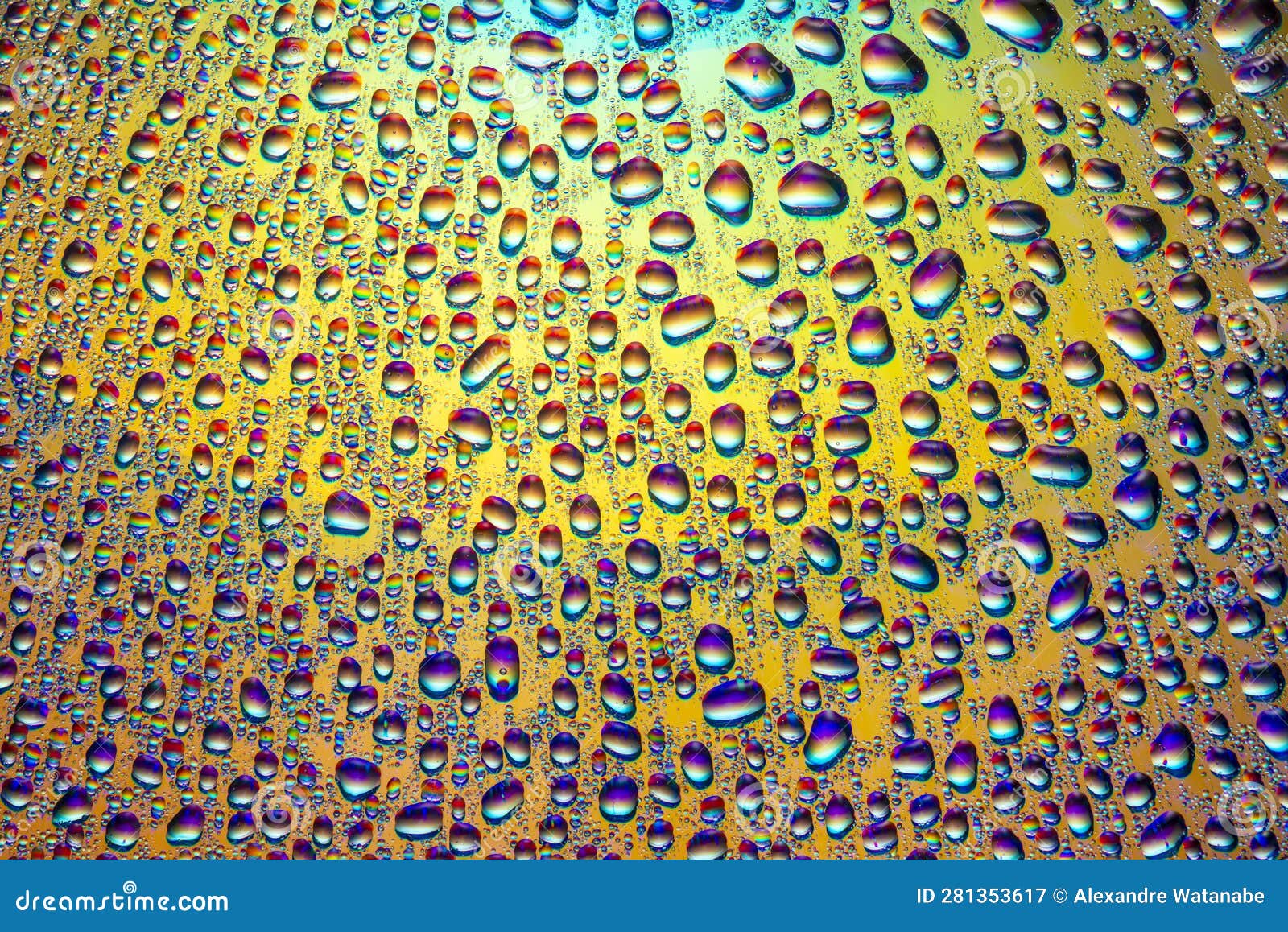 Droplets of Water Over a Yellowish Gradient Reflective Surface Stock ...