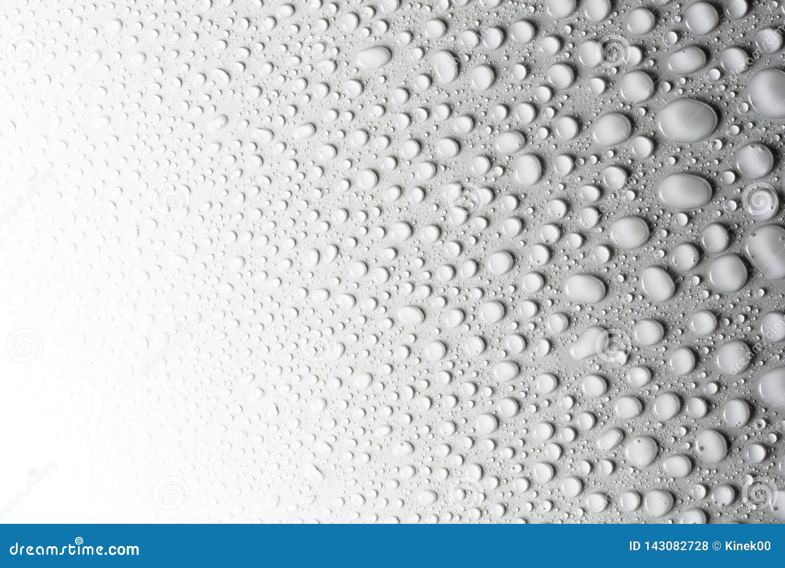 Droplets of Water on a White, Matte Background Illuminated with a ...