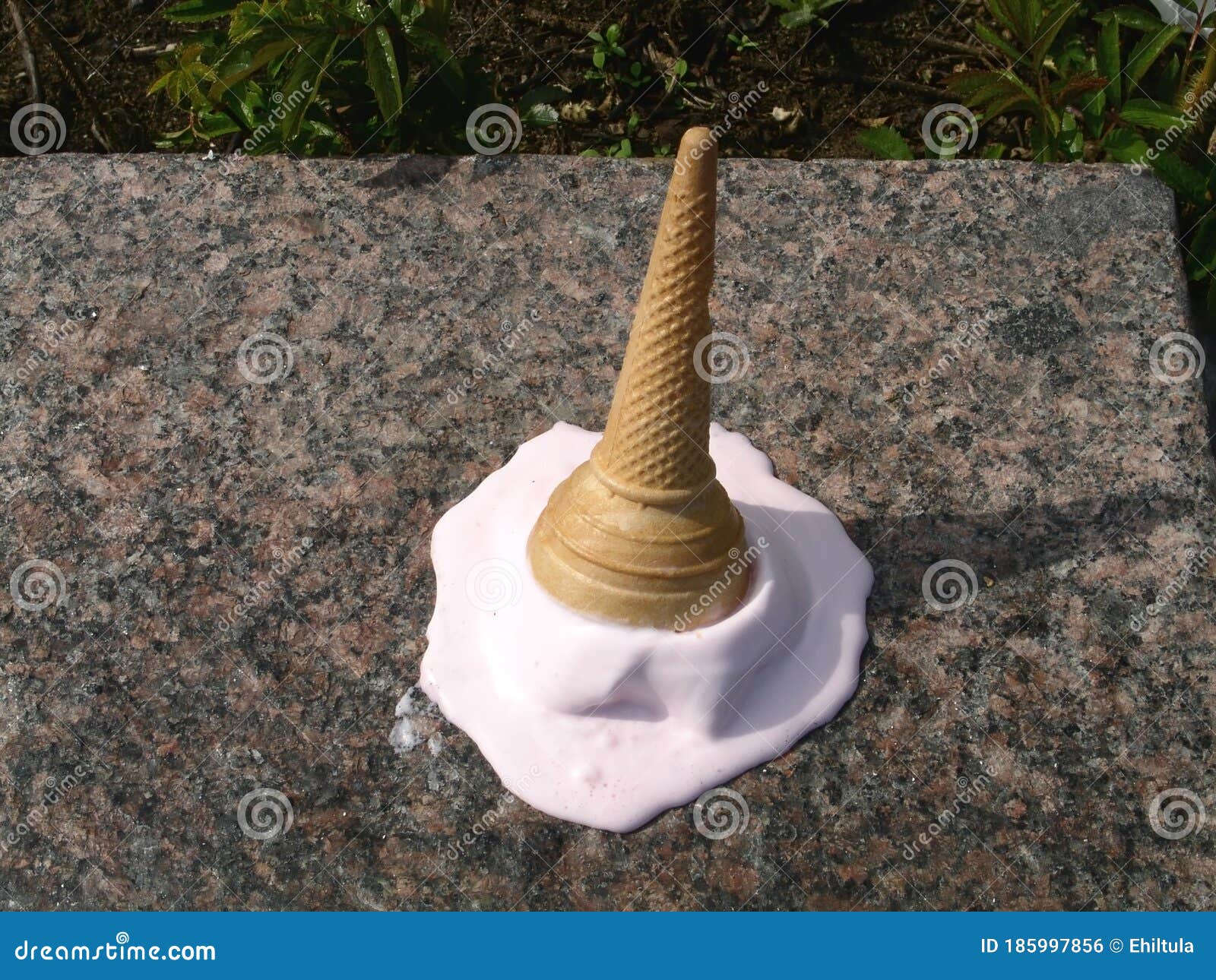 Dropped Ice-cream Cone Melting on Ground in Summertime Stock Photo ...