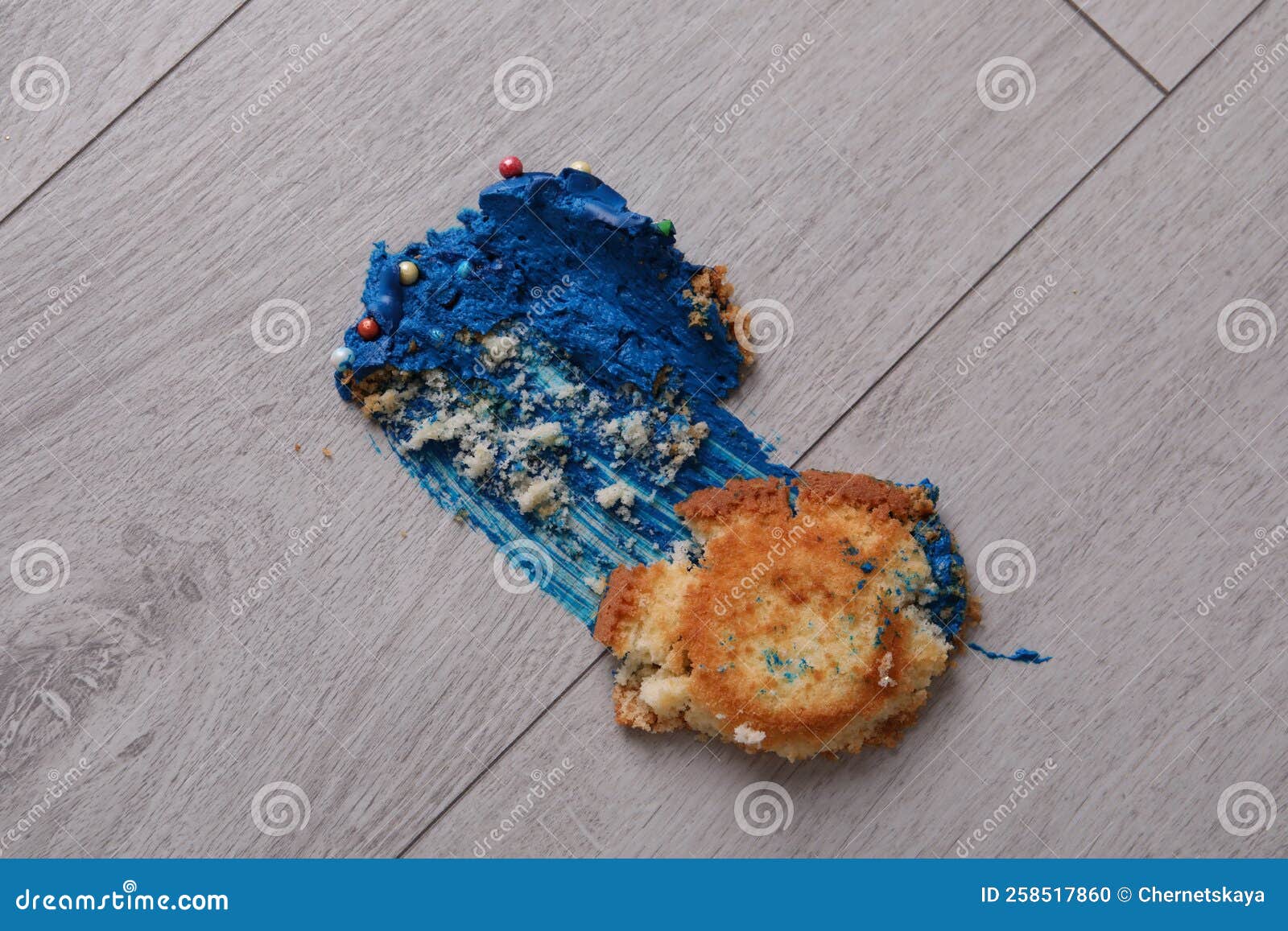 Dropped and Smashed Cupcake with Cream on Floor. Troubles Happen Stock ...