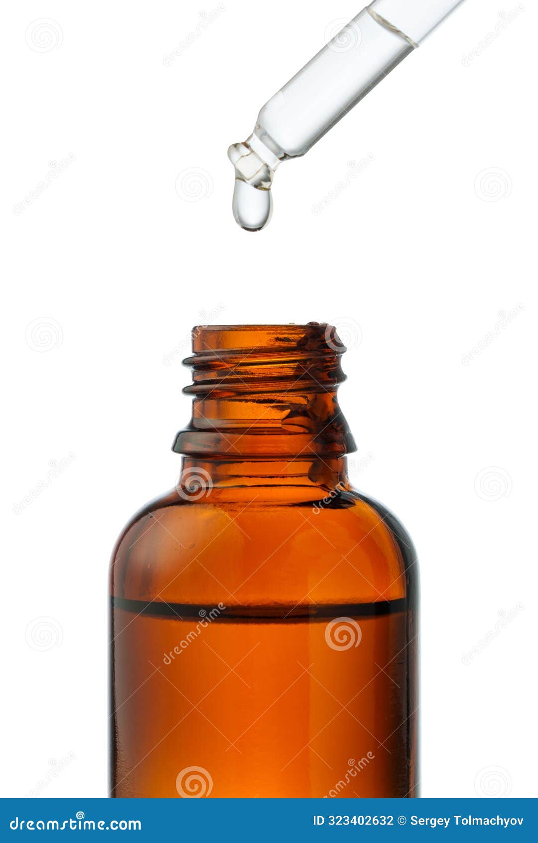 Dropper Bottle with Liquid Dropping on a White Background Stock Photo ...