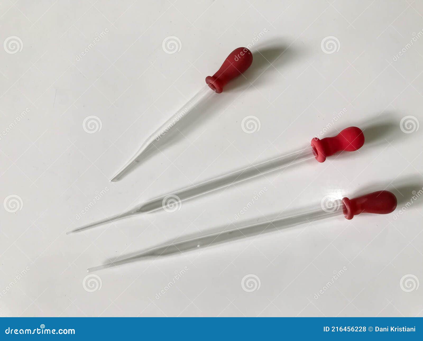Dropper Pipette In Beaker And Scientist Using Dropper Pipette Transfer ...