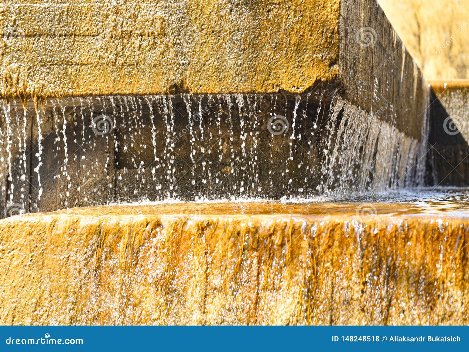 Drops of Cold Water Run Down the Stones in the Fountain in Summer Stock ...