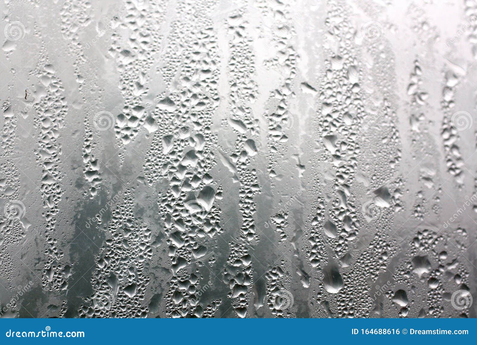 Drops of Condensation on a Transparent Surface. Flowing Drops of Water ...
