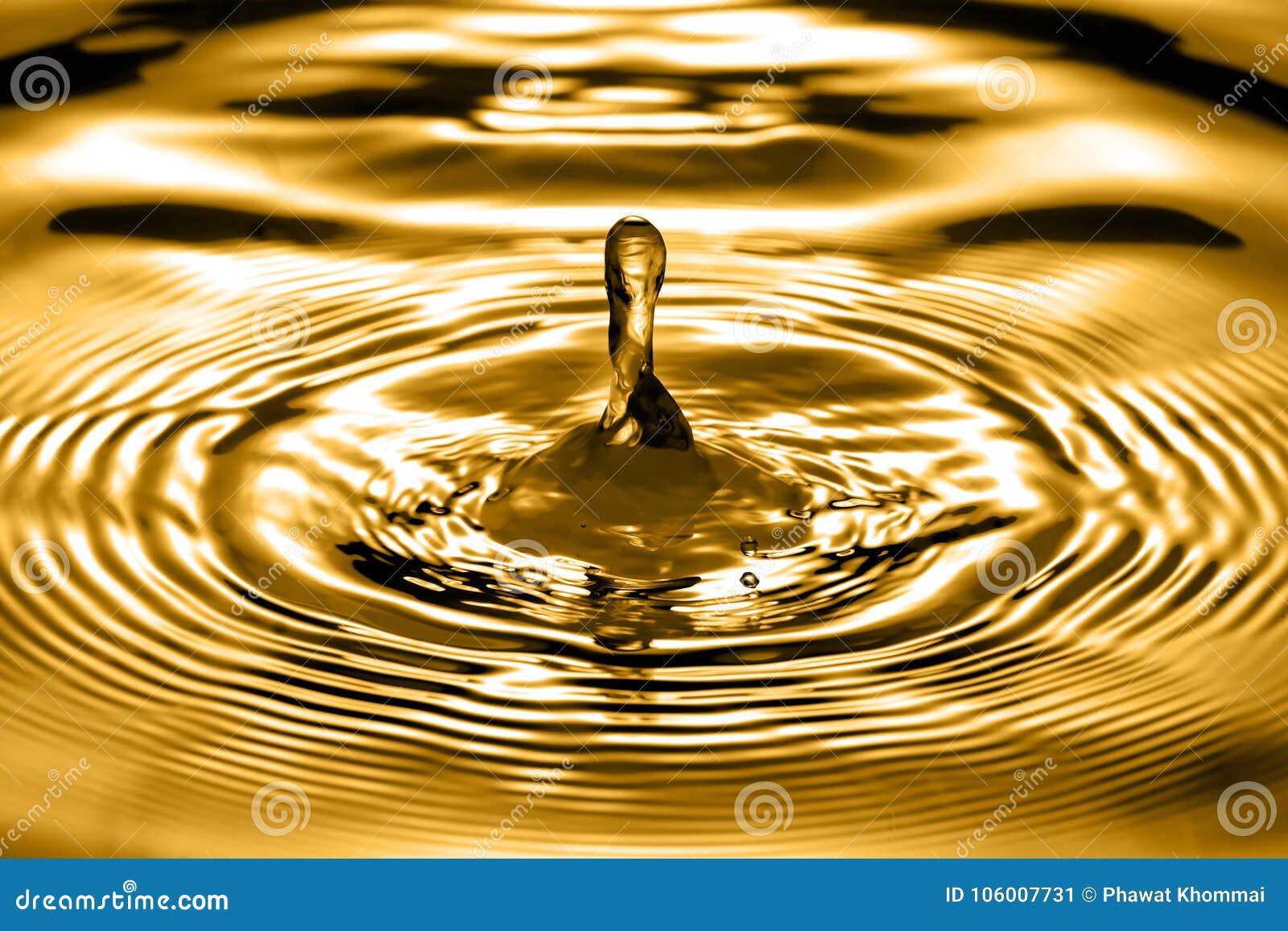 Drops of Liquid Gold Close Up Stock Image - Image of fluid, droplet ...
