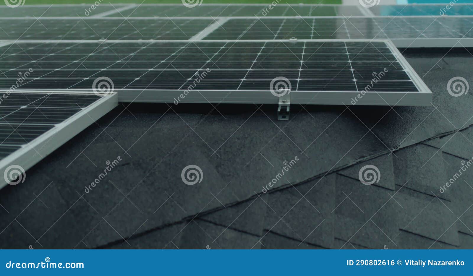 Drops of Rain Fall on the Solar Panels on the Roof of the House Stock ...