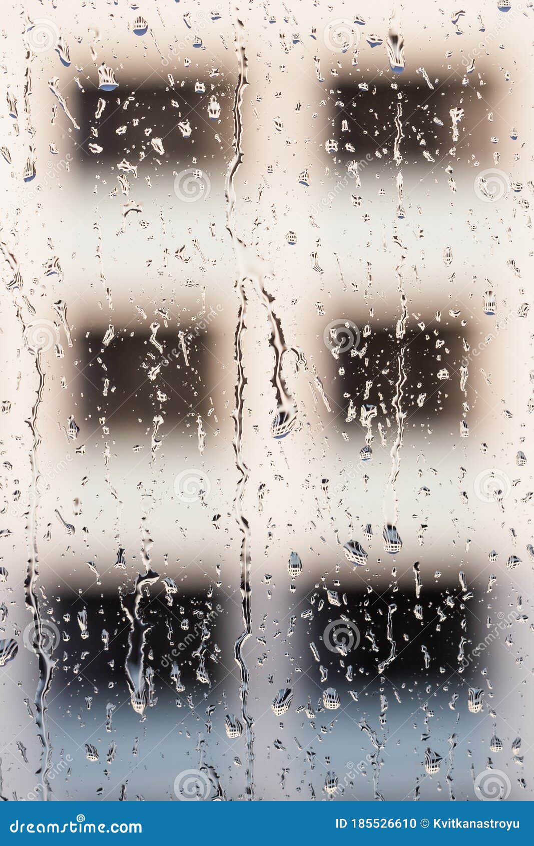 Drops of Rain on a Window Glass on the Building Background Stock Photo ...
