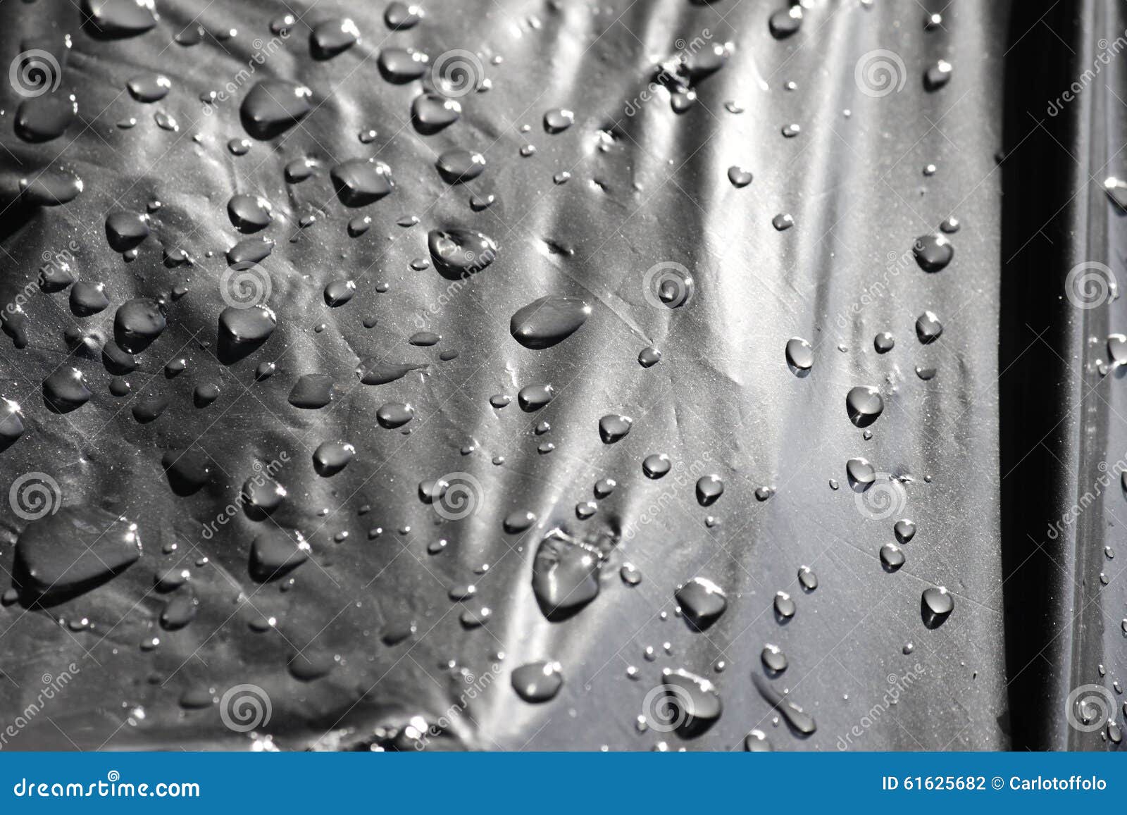 Drops of Water on Black Plastic Stock Photo - Image of waste, elements ...