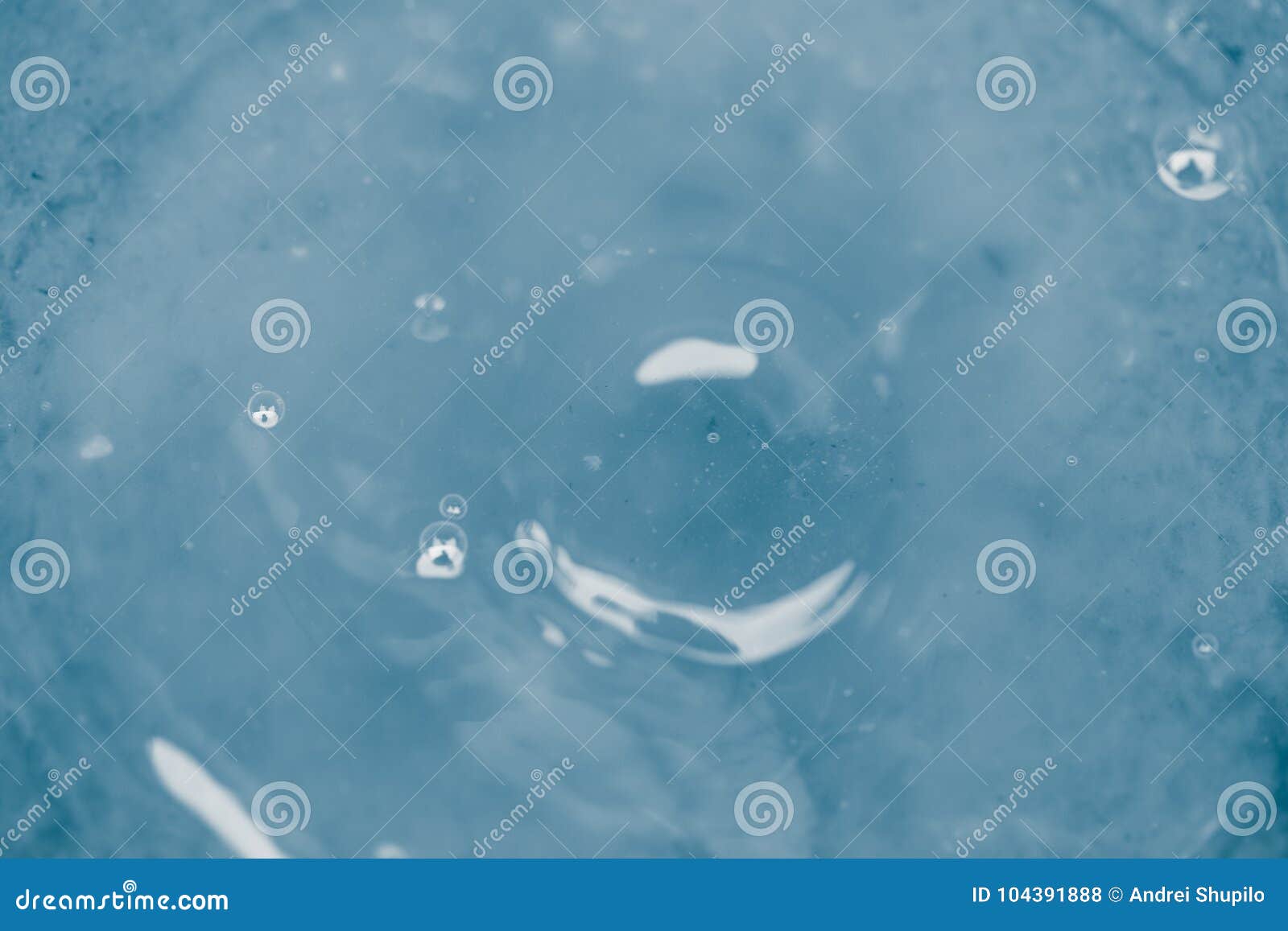 Drops of Water Dripping into a Puddle Stock Photo - Image of circle ...