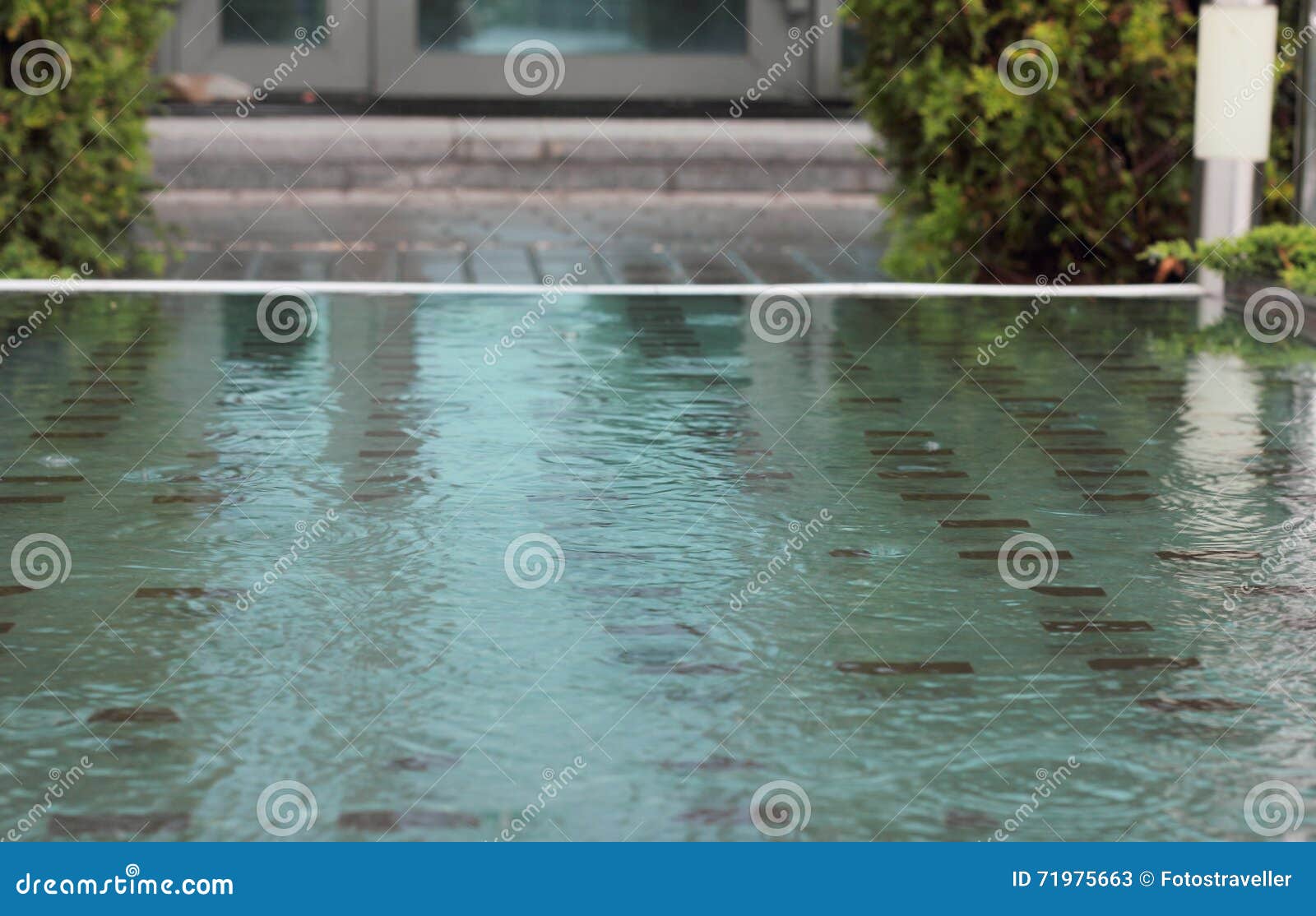 Drops of Water Dripping into a Puddle Stock Image - Image of dripping ...