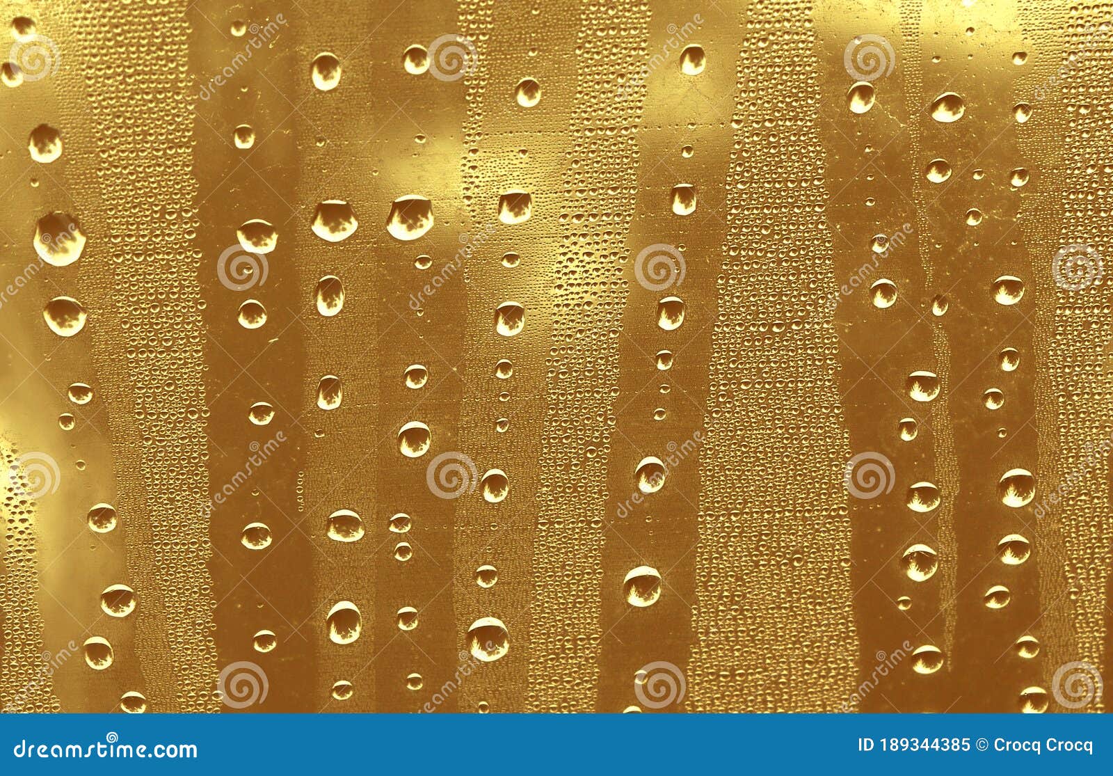 Drops of Water Due To Condensation on a Golden Surface Stock Image ...