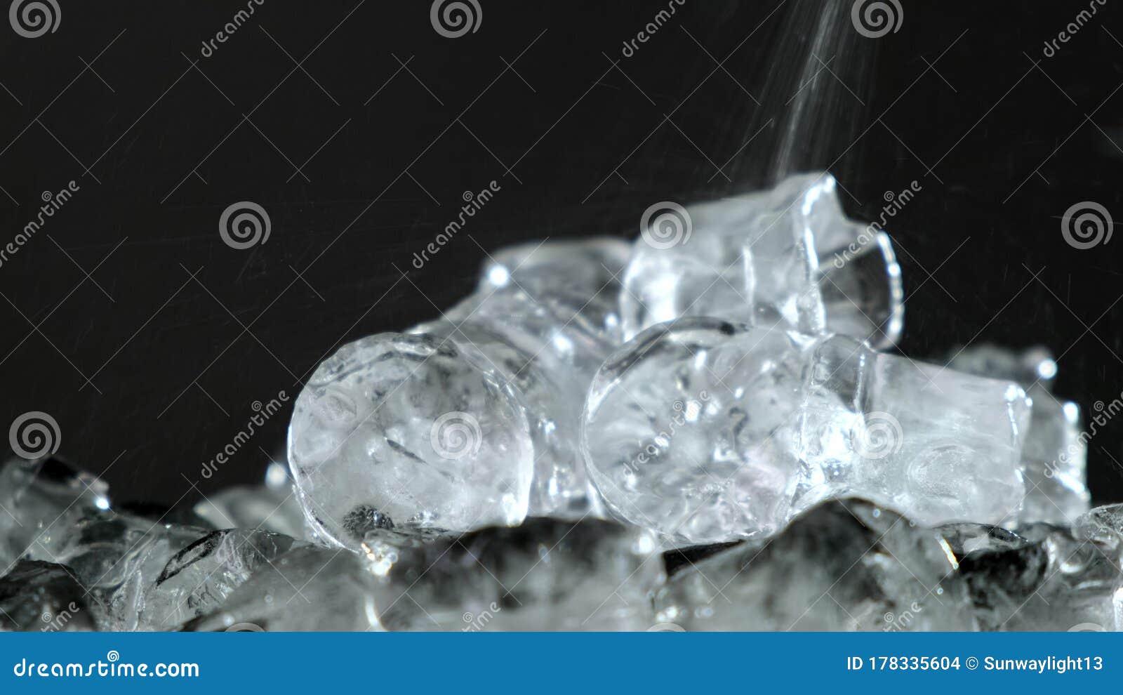 Drops of Water Fall on Ice Cubes. Close Up. Stock Photo - Image of ...