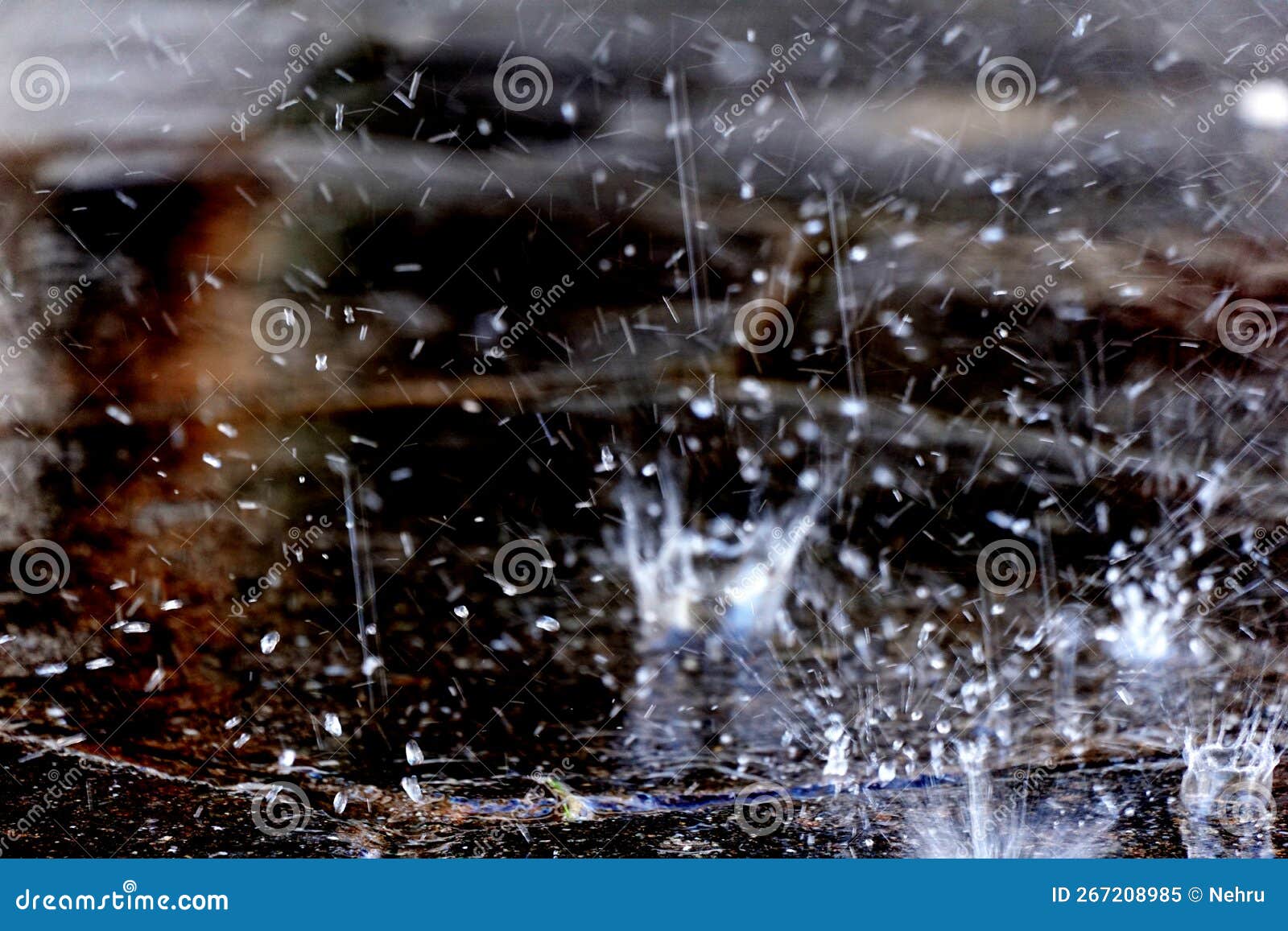 Drops of Water Splashing on a Pavement Surface Stock Image - Image of ...
