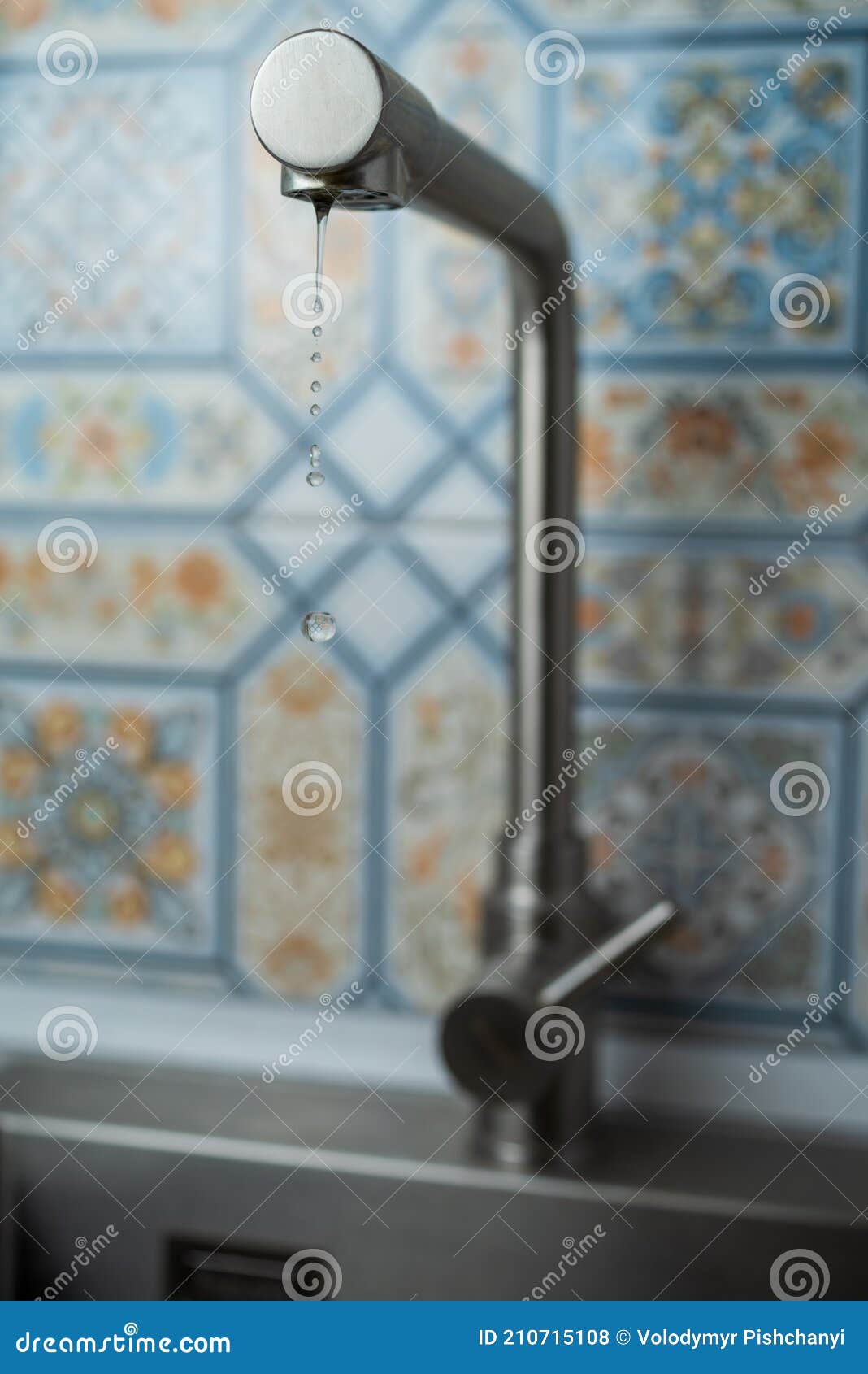 Drops of Water from the Tap Drip into the Kitchen Sink Stock Photo ...