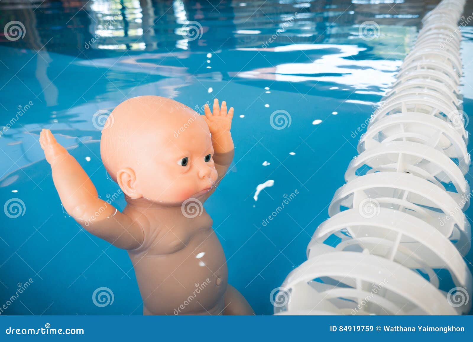 Drowned doll in pool stock image. Image of danger, summer - 84919759