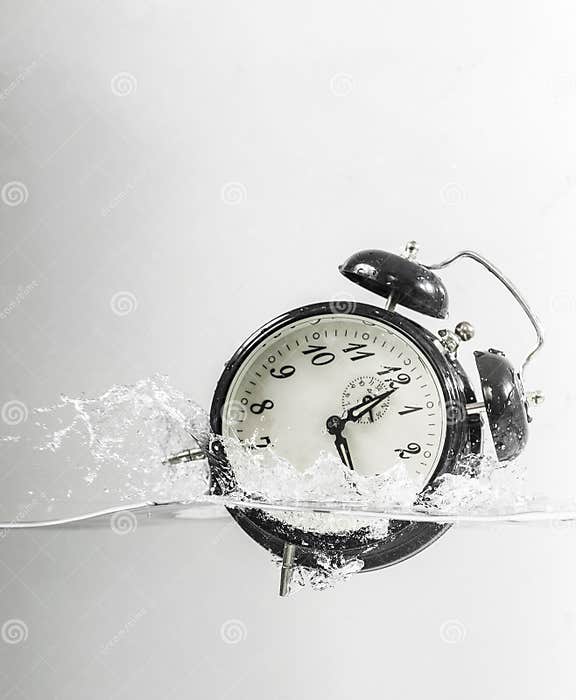 Drowning Clock in the Water Stock Photo - Image of conceptual, movement ...