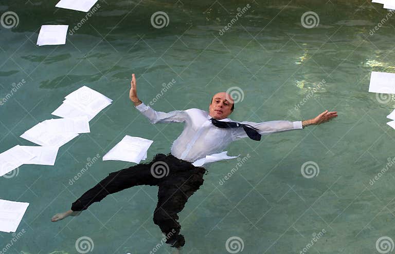 Drowning in paperwork stock photo. Image of sink, businessman - 2286560