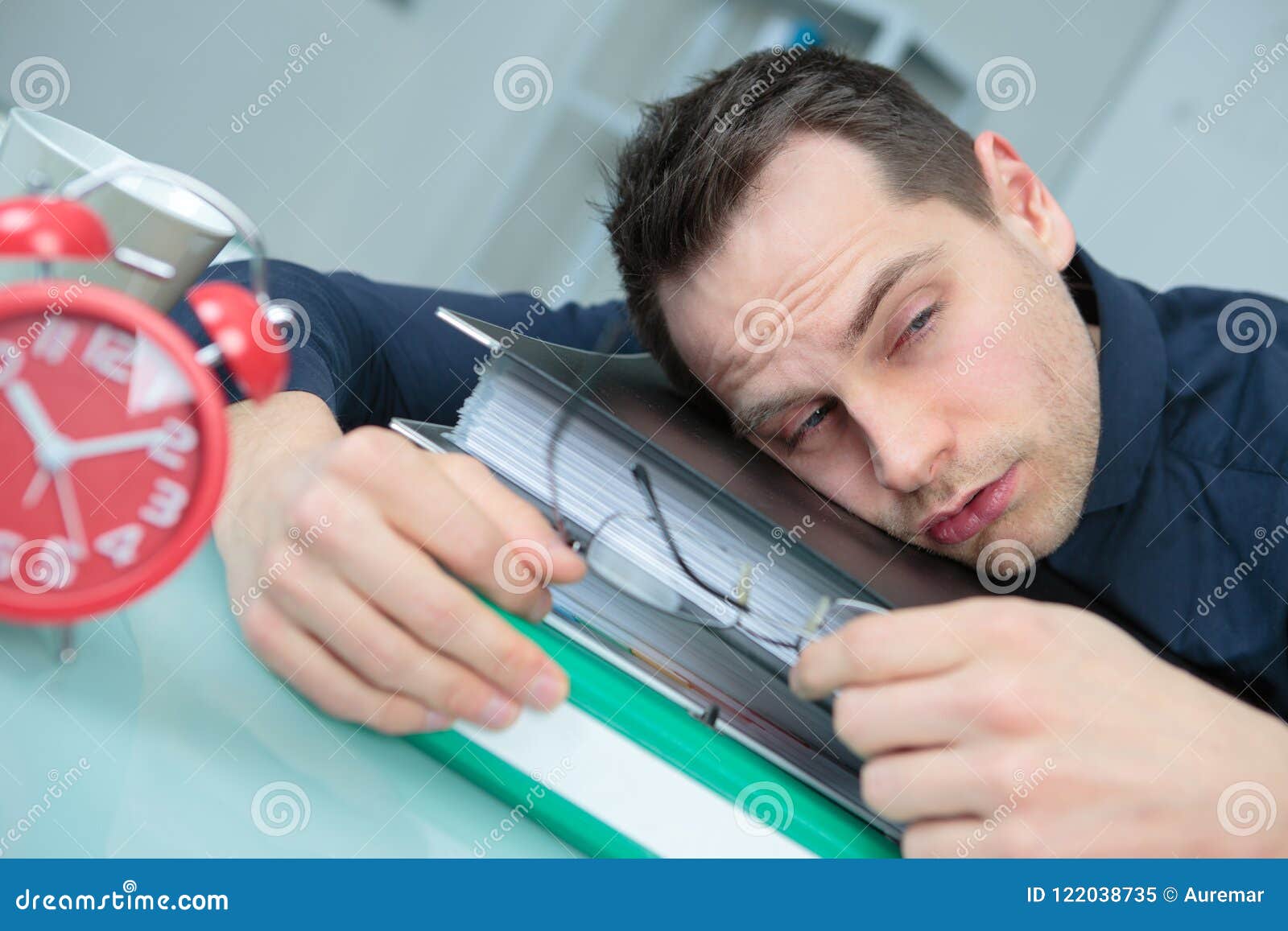 Drowsy Man Slumped on Folders Stock Image - Image of suit, young: 122038735