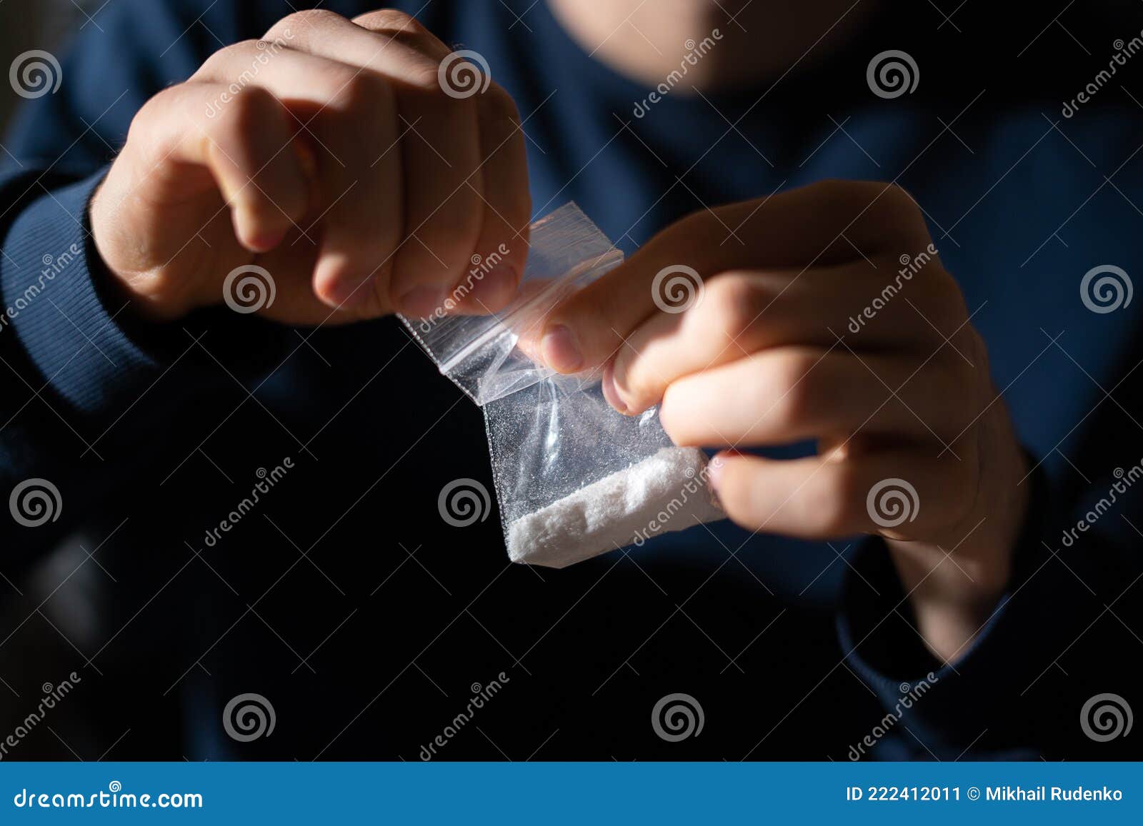 The Drug Addict Hands Holding a Small Package with White Powder Stock ...