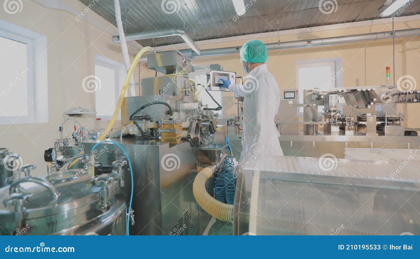 Masked People Work in a Factory. Drug Manufacturing Process. Inside the ...