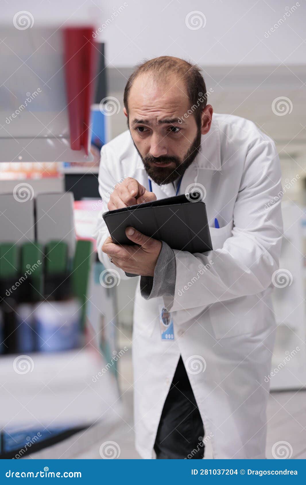 Drugstore Employee Doing Medication Inventory Checking Pills Packages ...