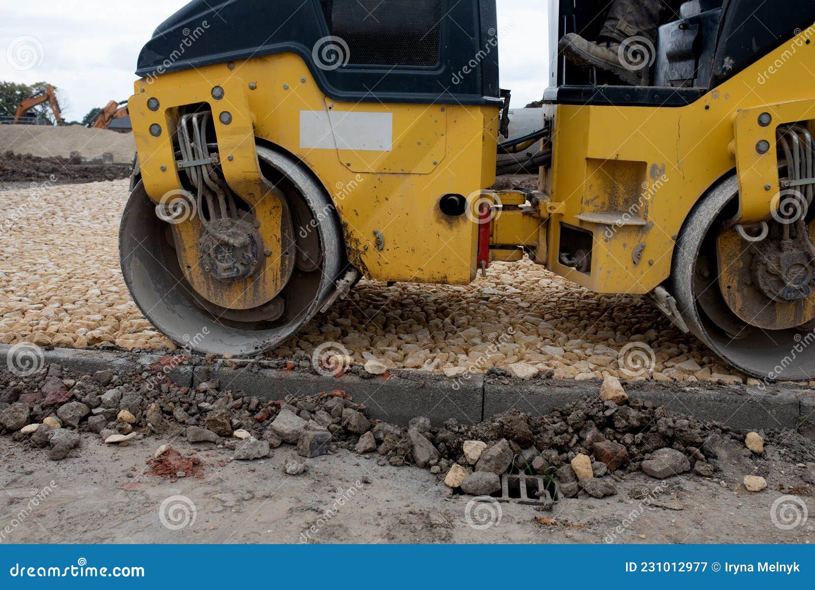 Drum Ride on Roller Compacting Freshly Laid Tarmac during Roadworks ...