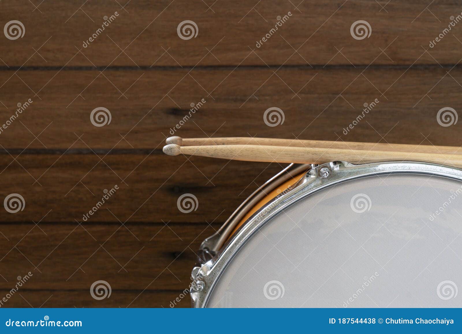 Drum and Drum Stick on Wooden Table Background, Top View, Music Concept ...