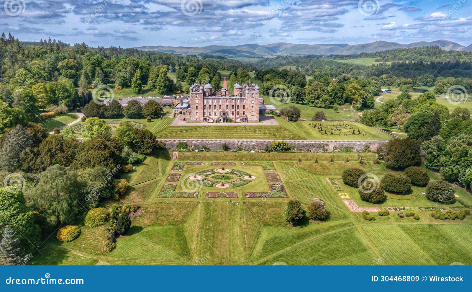Drumlanrig Castle, Scotland Encompassed by Vast Greenery Stock Image ...