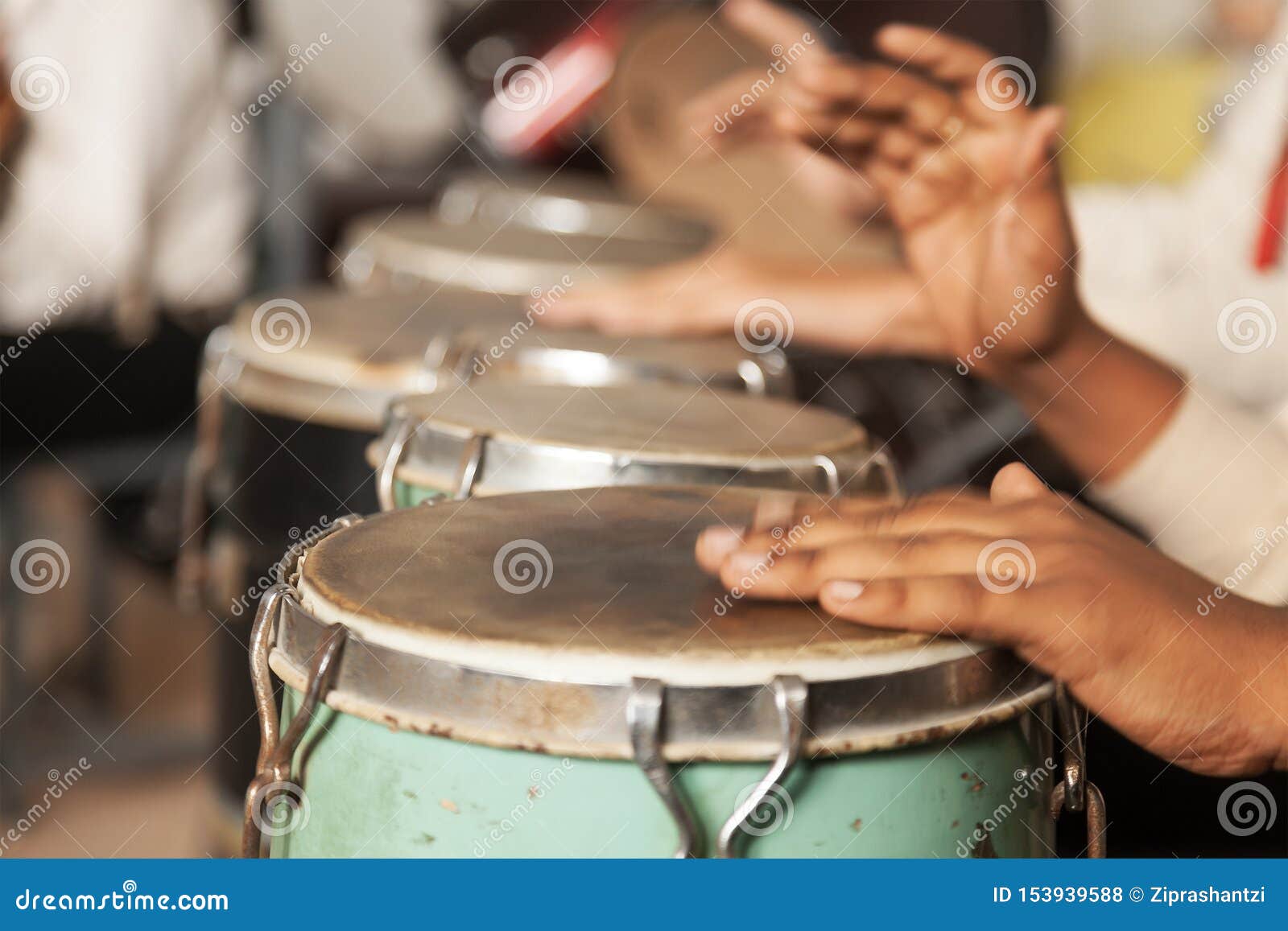 A Drummer in Action - Playing Bongo Stock Photo - Image of drumstick ...