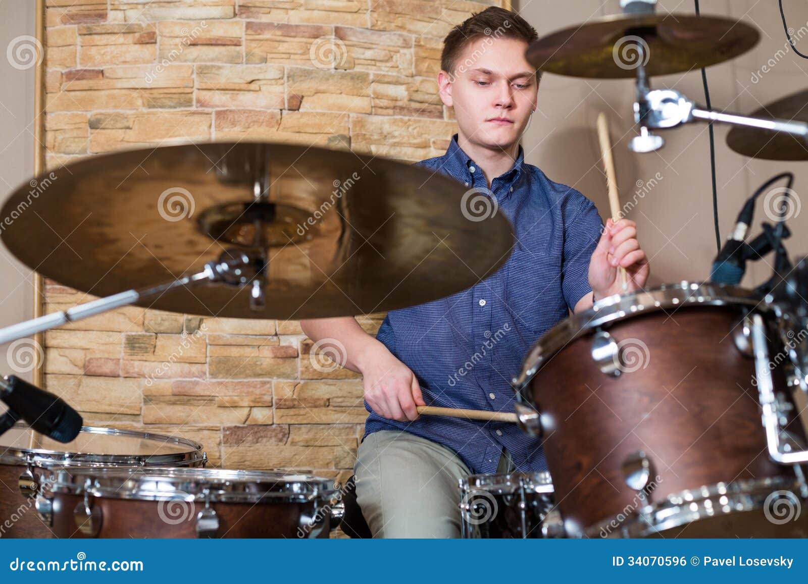 Drummer Plays the Drum Kit in the Studio Stock Photo - Image of hair ...