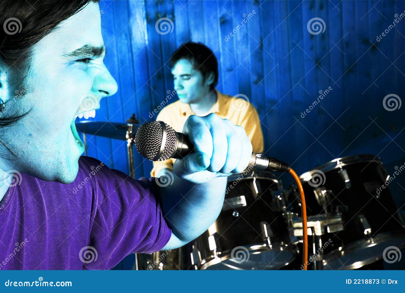 Drummer and rock singer stock image. Image of person, energy - 2218873